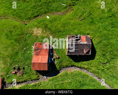 Aerial image of a derelict farmhouse and field in disarray Stock Photo ...