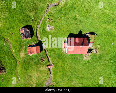 Aerial image of a derelict farmhouse and field in disarray Stock Photo ...