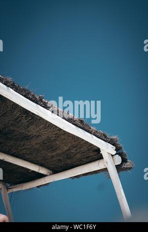 Low angle shot of a tree and a gazebo in a field Stock Photo - Alamy