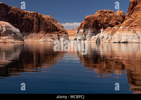 Reflections in Iceberg Canyon on Lake Powell showing the high water ...