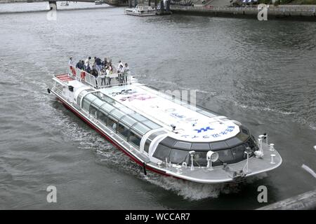 Water bus on the Sumida River and Tokyo Sky Tree Stock Photo - Alamy
