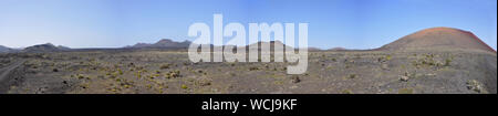 Panoramic view over barren volcanic landscape on Spanish canary island ...