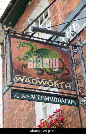 Green Dragon pub sign, Wadworth beer, Marlborough, Wiltshire, England ...
