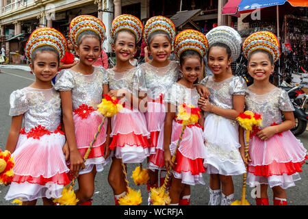 A Group Of Filipino Elementary Schoolchildren Pose For A Photo During ...