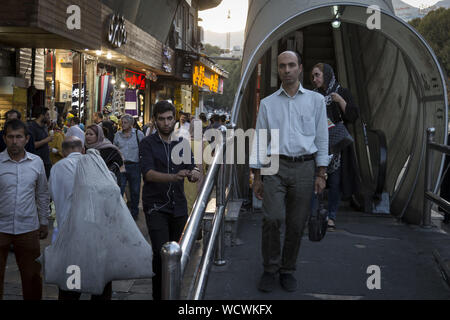 People walk at Tajrish square in northern Tehran, Iran, Friday, Feb. 20 ...
