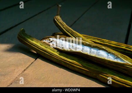 A Few Ice Cream Bean (Pacay Fruit) on Wood Terrace Stock Photo - Alamy