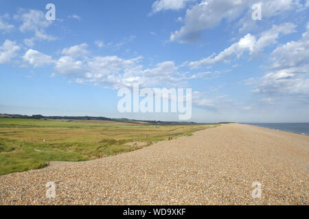 A seaside view of the shoreline at Kelling Beach, Norfolk, England ...