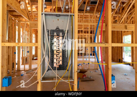 Electrical Circuit Breaker panel in new home construction, with spray ...