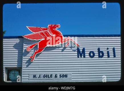 Gile & Son Mobil Gasoline sign, Main Street, Delhi, New York; ca. 1976 ...
