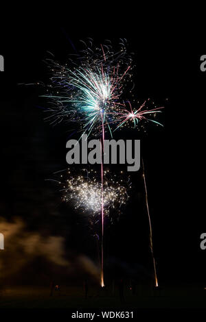 Long exposure of people letting off fireworks Stock Photo - Alamy