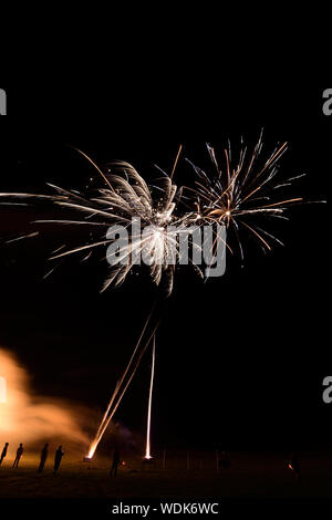 Long exposure of people letting off fireworks Stock Photo - Alamy