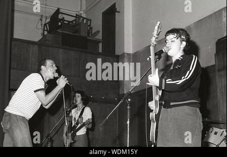 Chris Rowley and Niki Elliot of Riot grrrl band Huggy Bear performing ...
