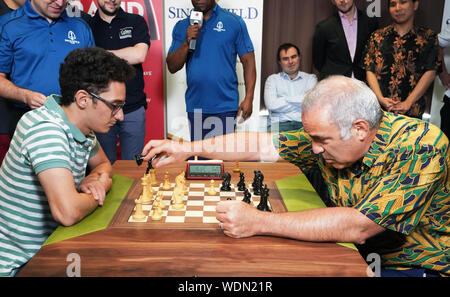 Sinquefield Cup champion Fabiano Caruana, left, enjoys the moment ...