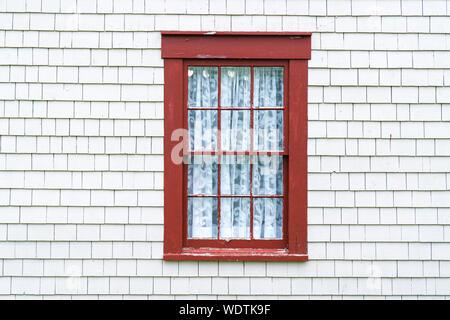 Rustic window detail with red wooden frame, peeling paint, old linen ...