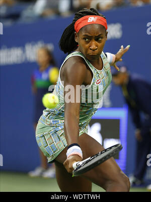 United States' Coco Gauff hits a return against Canada's Victoria Mboko ...
