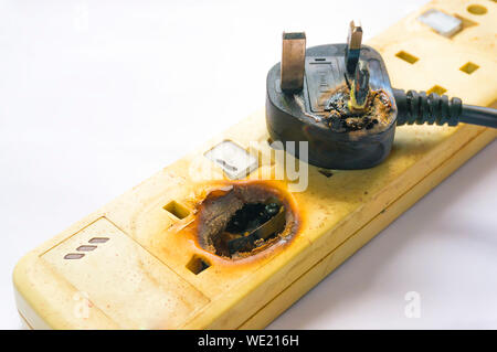 Burnt electrical plug Stock Photo - Alamy