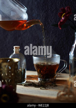 tea poured from a teapot on a white background in the restaurant Stock ...