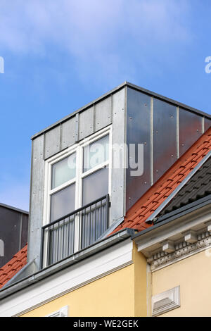 Modern chimney and roof, metal chimney, grey roof Stock Photo - Alamy