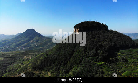 Mengyin. 30th Aug, 2019. Aerial photo shows tourists visiting the Daigu ...