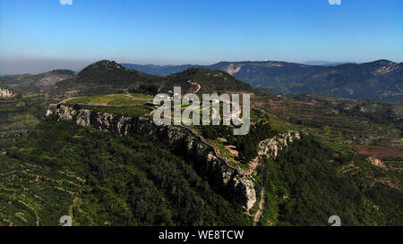 Mengyin. 30th Aug, 2019. Aerial photo shows tourists visiting the Daigu ...