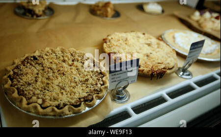 A pie is a baked dish which is usually made of a pastry dough casing ...