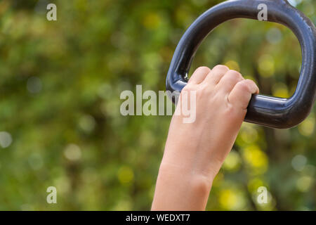 hand grabbing bars Stock Photo: 9677275 - Alamy