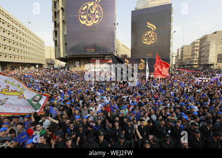 Baghdad, Iraq. 30th Aug, 2019. Supporters of Iraqi Shiite Muslim cleric ...