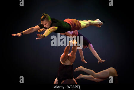 Artists perform during a performance of Humans by contemporary circus ...