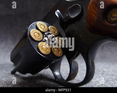 A used long barrel .38 special Taurus revolver gun displayed at a ...