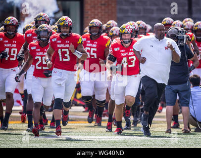 Maryland head coach Mike Locksley looks on during pre-game warm-ups ...