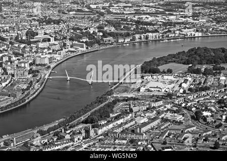 The famous Peace Bridge over Foyle river, located in Derry, Northern ...