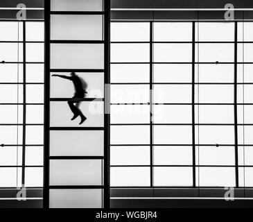 Man falling through the air Stock Photo - Alamy