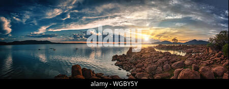 Sunset at Gaborone dam, in Botswana after a short rainfall Stock Photo ...
