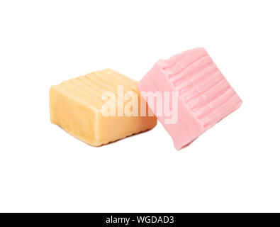 Two square chewy candies on white background Stock Photo - Alamy