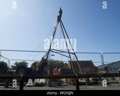 A cable percussion borehole drilling rig set up, ready to work Stock ...