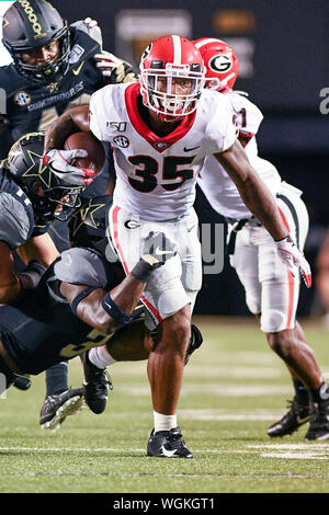 Georgia running back Brian Herrien (35) runs out of bounds and into a ...