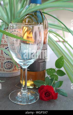 spider plant on wood table Stock Photo - Alamy