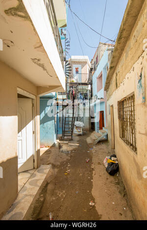 Corridor of Street Between Two Small Buildings Stock Photo - Alamy