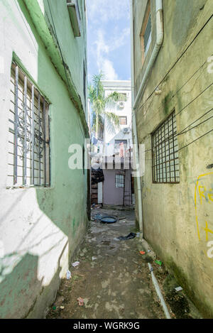 Corridor of Street Between Two Small Buildings Stock Photo - Alamy