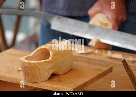 Dutch clog wooden shoe making machines Stock Photo - Alamy