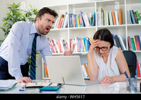 Boss screaming at frustrated employee, bullying and emotional abuse at ...