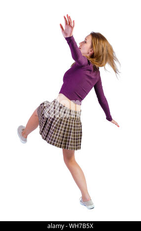 Back view of the falling girl. the girl slipped. Rear view people ...