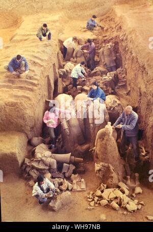 Chinese archaeologists work on terracotta warriors in the No.1 Pit at ...
