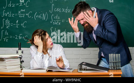 Man unhappy communicating. Conflict situation. School conflict ...