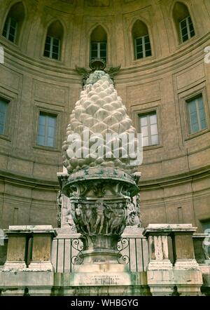 Ancient bronze Pigna, or pine cone, statue in the Vatican courtyard in ...