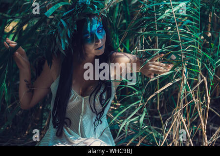 Young drown woman in a poetic representation. The concept of the undead ...