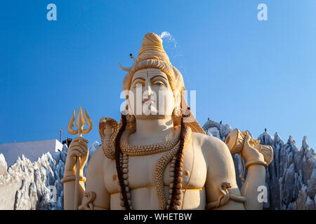 Lord Shiva statue at the Shivoham Shiva Temple, located in Bangalore ...