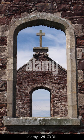 Stone building, gable end wall / detail of weathered sandstone ...