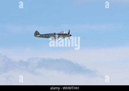 Supermarine Spitfire side view in reconnaissance camouflage against ...