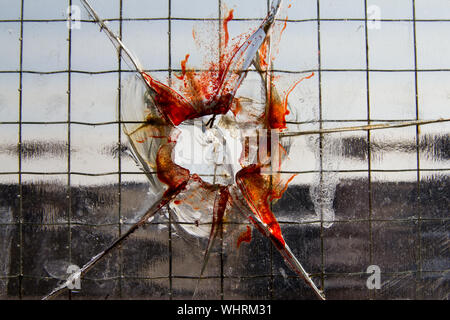 Broken glass with blood Stock Photo - Alamy